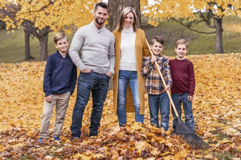 Family Group Having Fun Outdoors in Autumn Landscape Stock Photo ...
