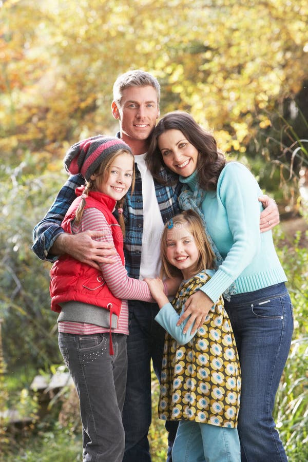 Family Group Standing Outdoors on Wooden Walkway Stock Photo - Image of ...