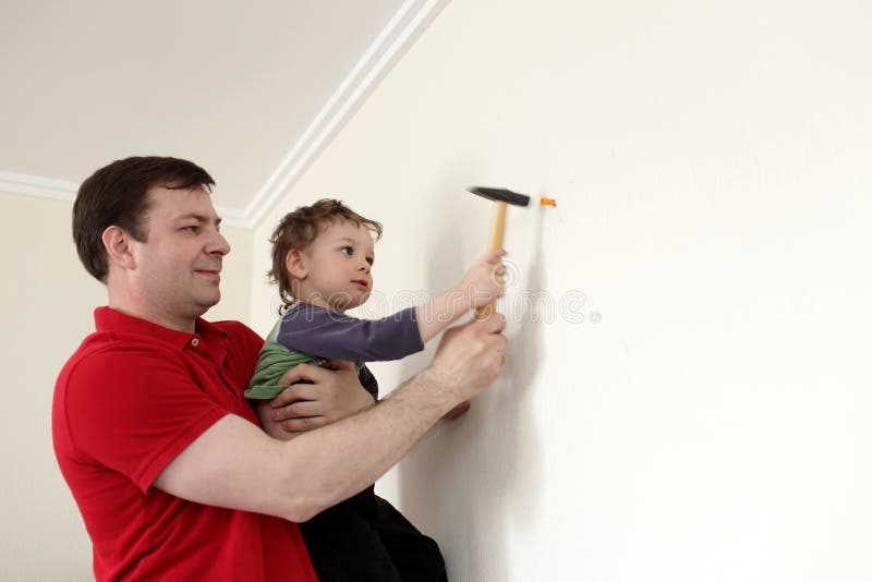 Father and Son Installing Mount TV Stock Photo - Image of concept ...