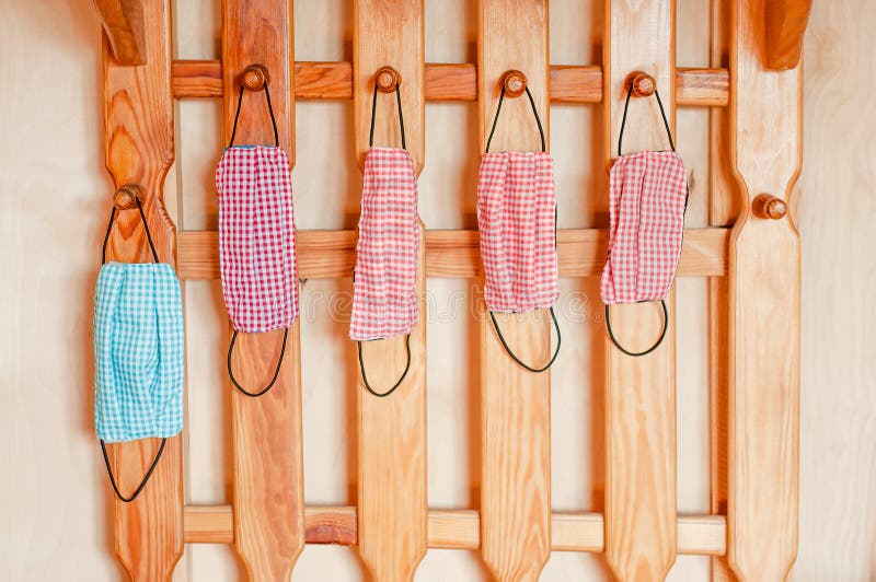 Family Hanger with Multi-colored Face Masks. Separate Masks for Each ...