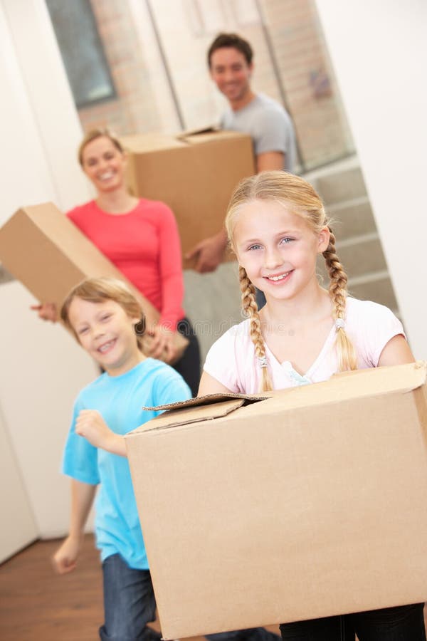 Family happy on moving day stock photo. Image of smiling - 18044284