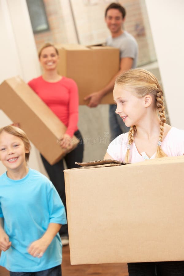 Family happy on moving day stock photo. Image of carry - 18044288