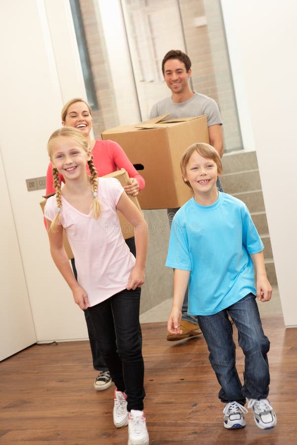 Family happy on moving day stock photo. Image of thirties - 18044324