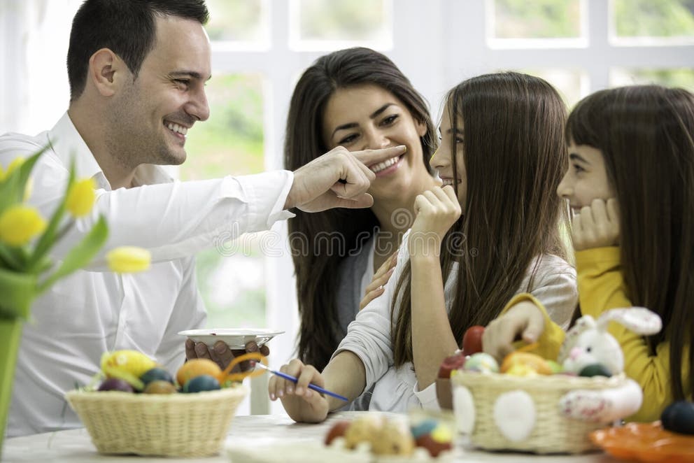 Family have fun on Easter stock image. Image of father - 51433047