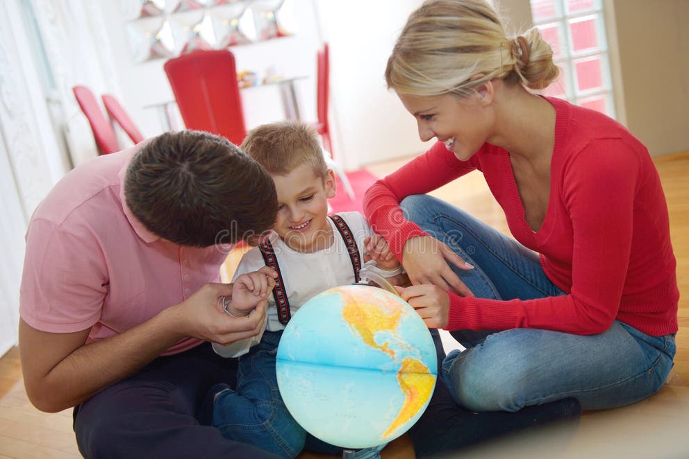 Family have fun with globe stock image. Image of earth - 36839765