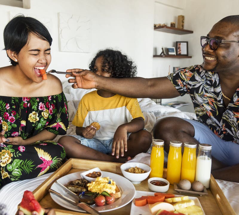 Family Having Breakfast in Bed Stock Image - Image of mother, family ...