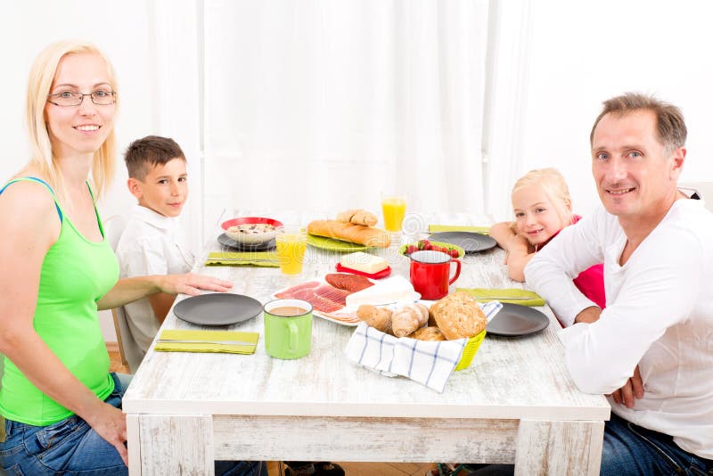 Family having breakfast stock photo. Image of happiness - 47245842