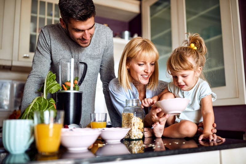 Family Having Breakfast in Kitchen Stock Image - Image of breakfast ...
