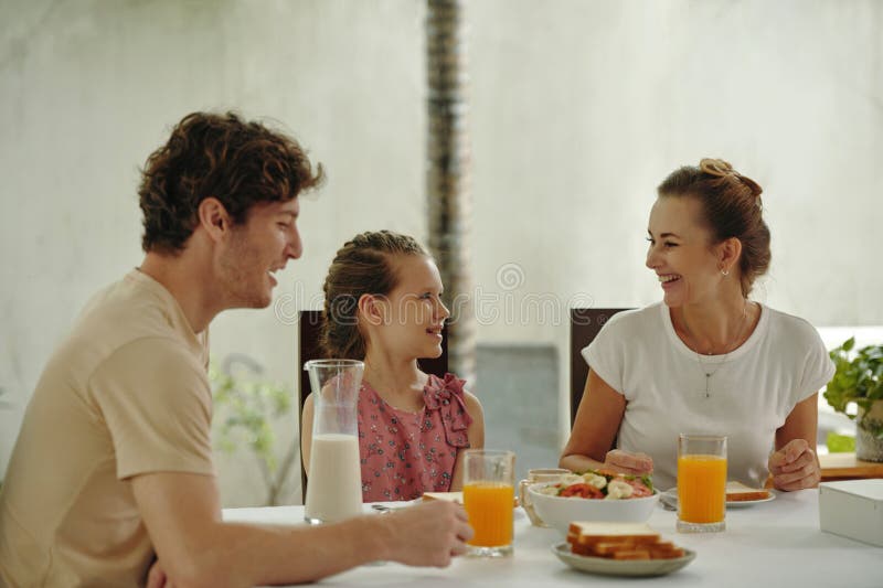 Family Having Breakfast at the Table Stock Image - Image of dining ...