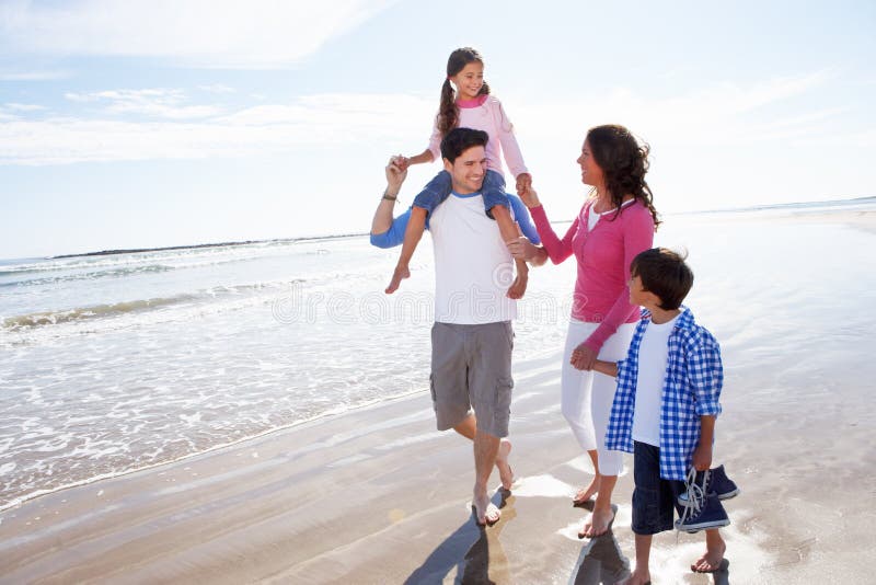 Family Having Fun on Beach Holiday Stock Image - Image of blue ...
