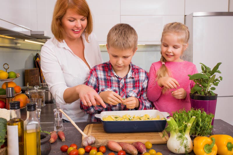 Family Having Fun Cooking in Kitchen Stock Image - Image of mother ...