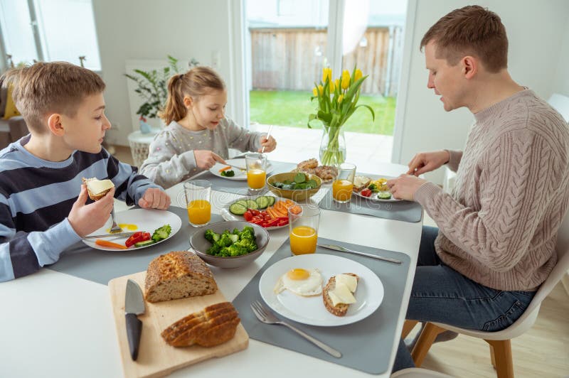 Family Having Healthy Breakfast at Home Stock Image - Image of ...