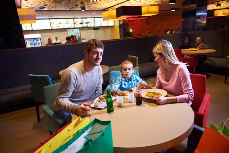 Family Having Lunch in Shopping Mall Stock Photo - Image of restaurant ...