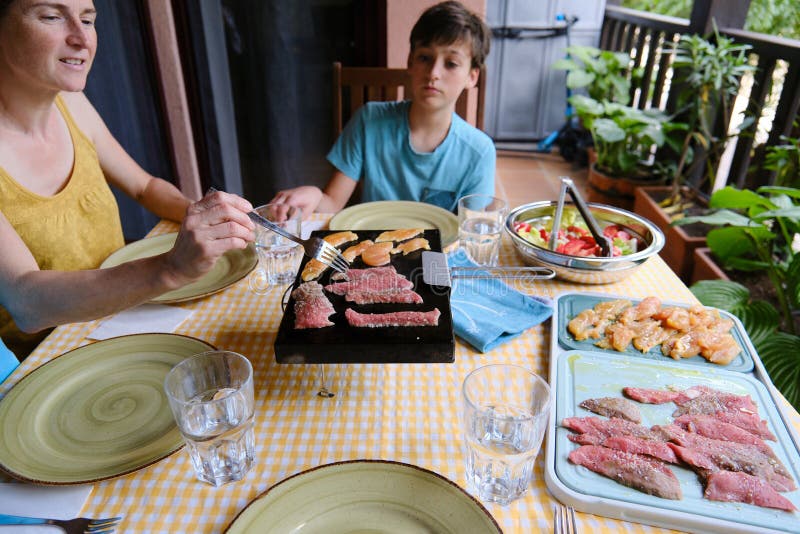 Family Having Lunch on the Terrace in Their Home Stock Image - Image of ...