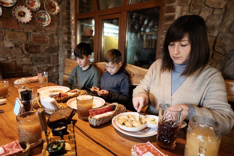 Family Having a Meal Together in Authentic Ukrainian Restaurant Stock ...