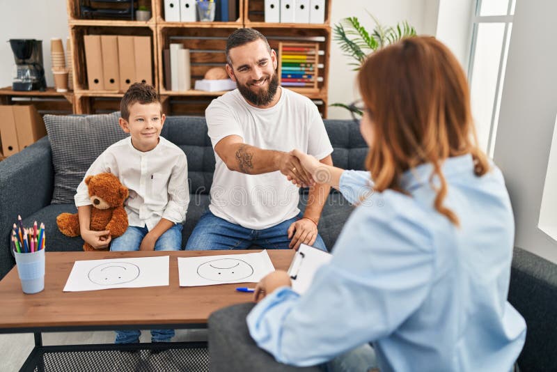 Family Having Psychology Session Shake Hands at Psychology Center Stock ...