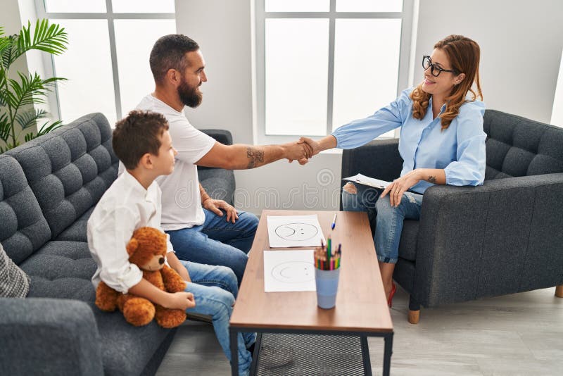 Family Having Psychology Session Shake Hands at Psychology Center Stock ...