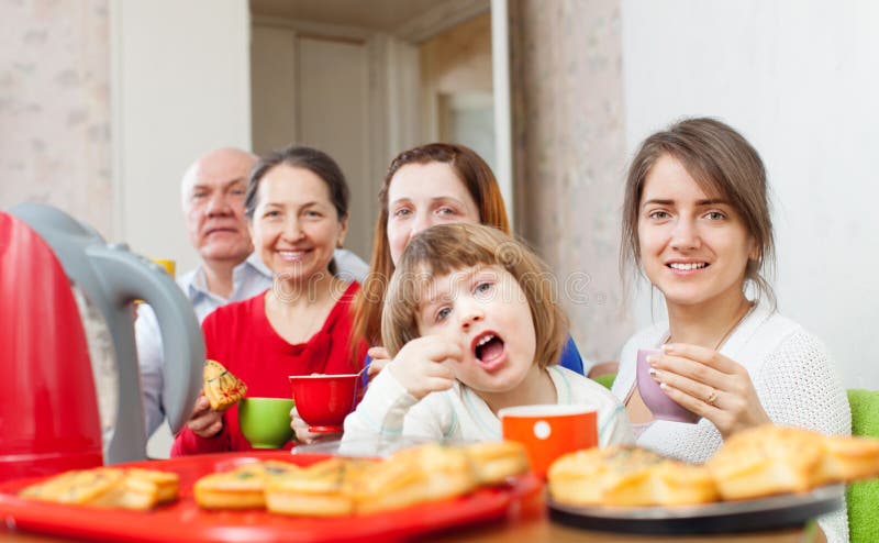 Family having tea at home stock photo. Image of children - 29736572