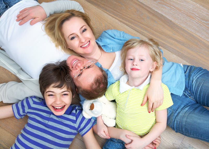Family at home stock image. Image of embracing, lifestyles - 28616149