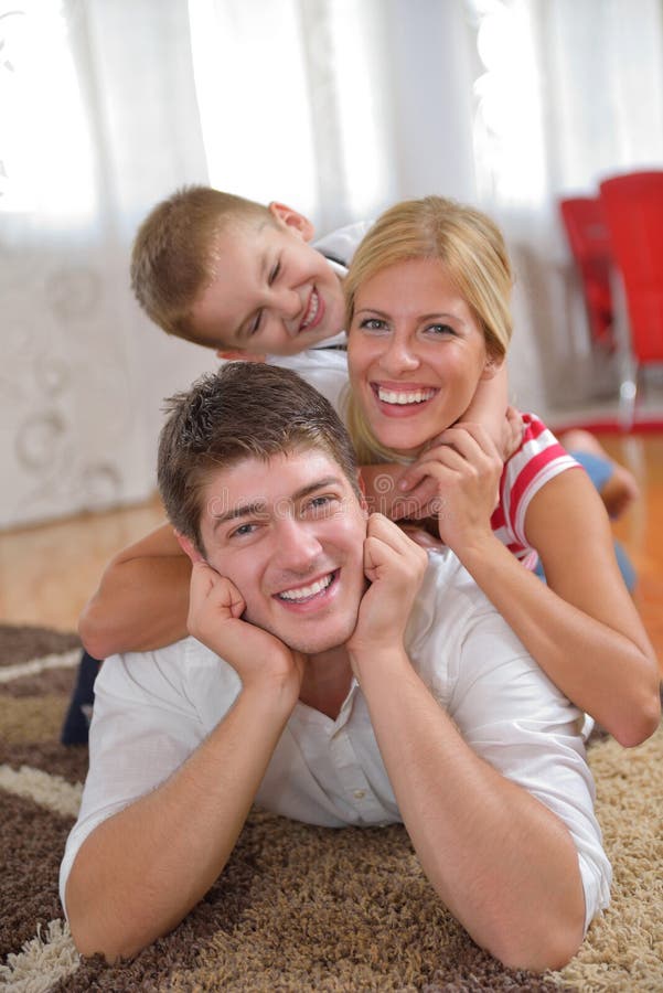 A happy family at home stock photo. Image of girls, love - 16966520
