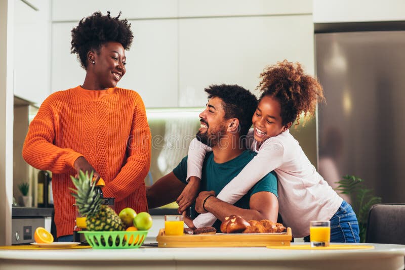 Family at Home Eating Breakfast in Kitchen Together Stock Image - Image ...