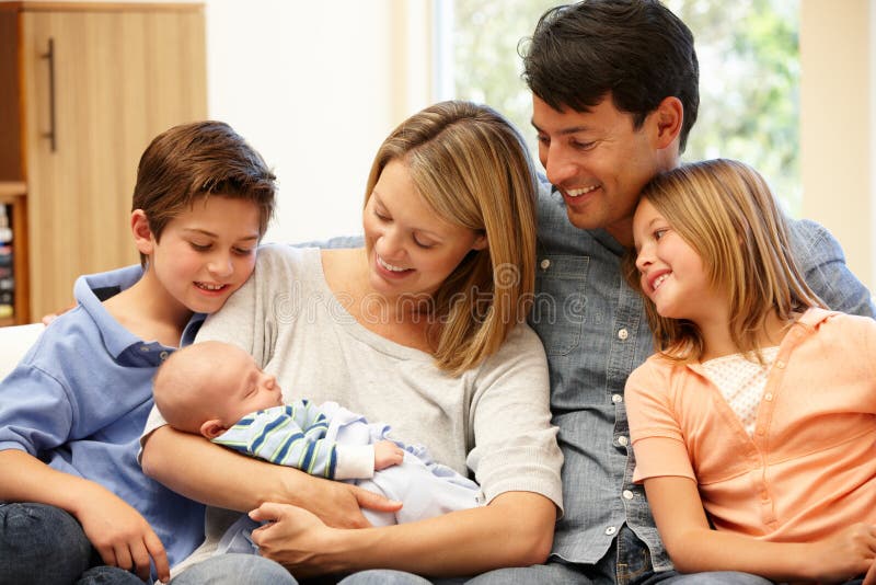 Family at Home with New Baby Stock Image - Image of home, female: 55893957