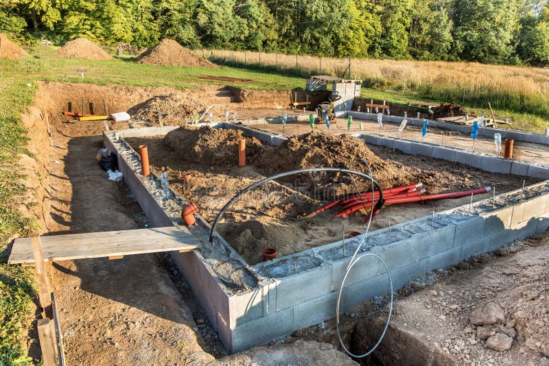 Family House Under Construction. Foundation of a Family House from Lost ...