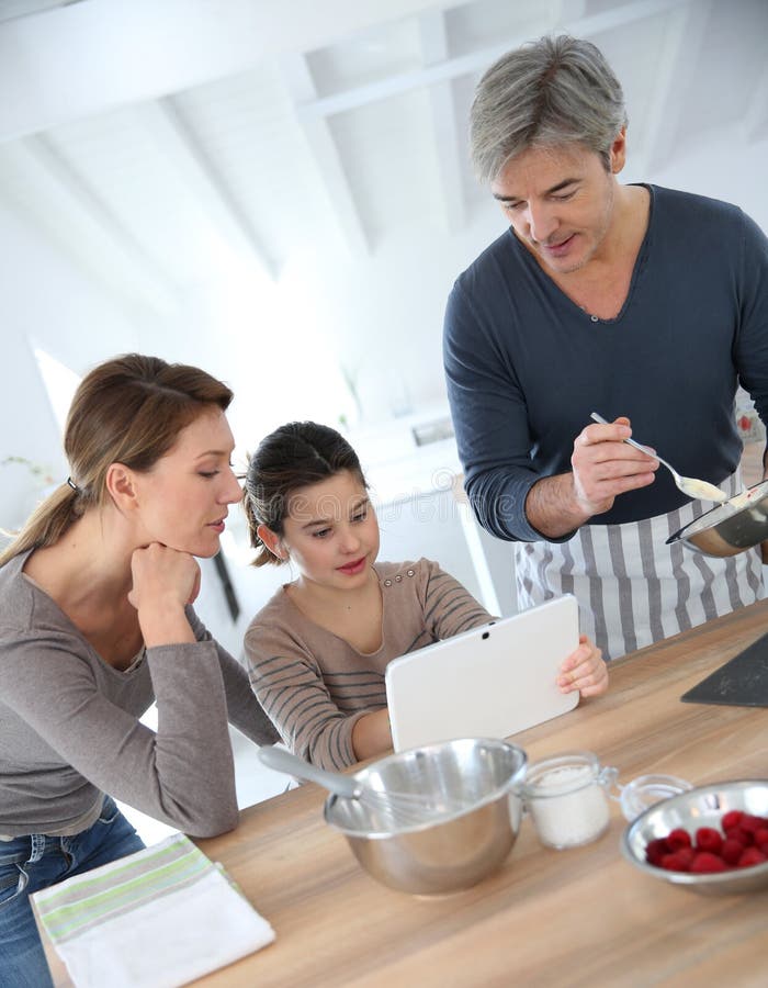 Family in Hte Kitchen Preparing Pastries Stock Photo - Image of girl ...