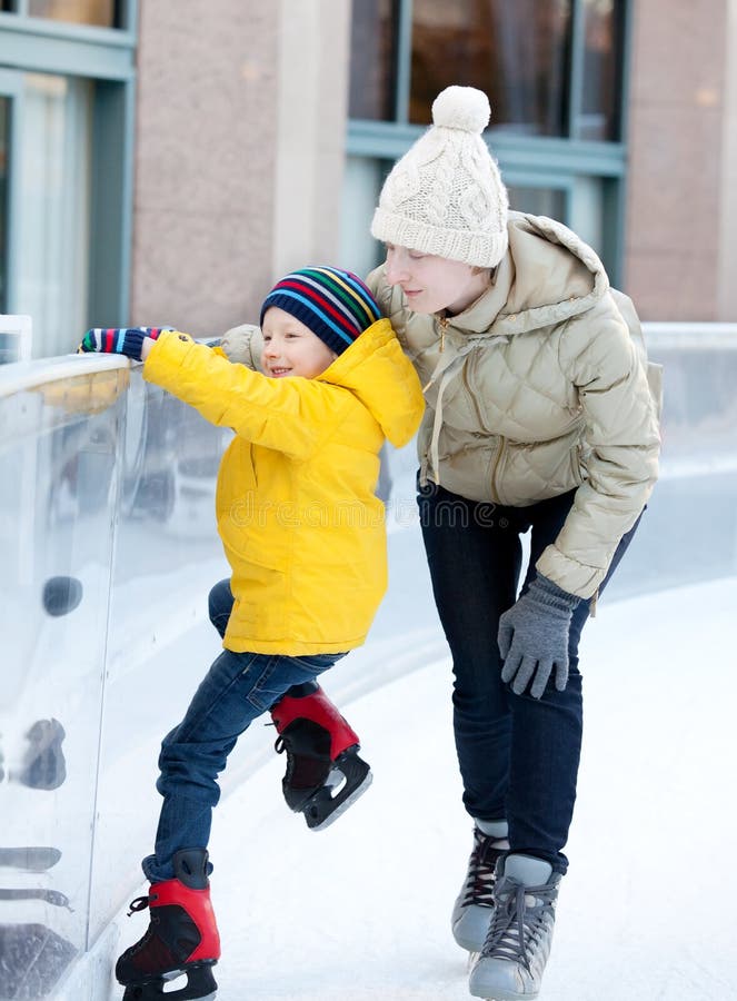 Family ice skating stock image. Image of holding, activity - 36680527