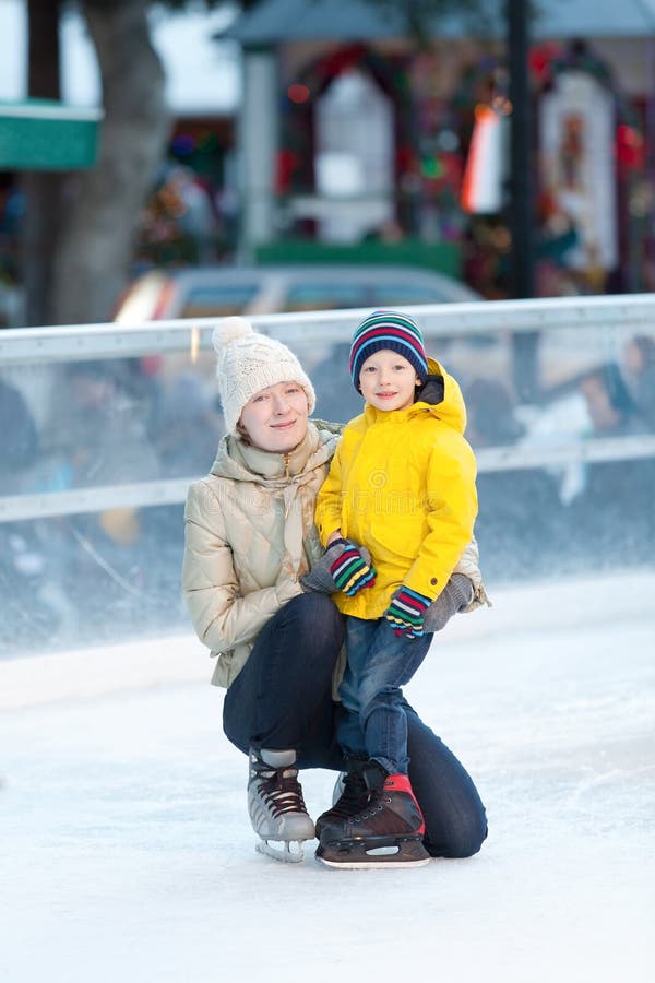 Family ice skating stock image. Image of happiness, rink - 35110067