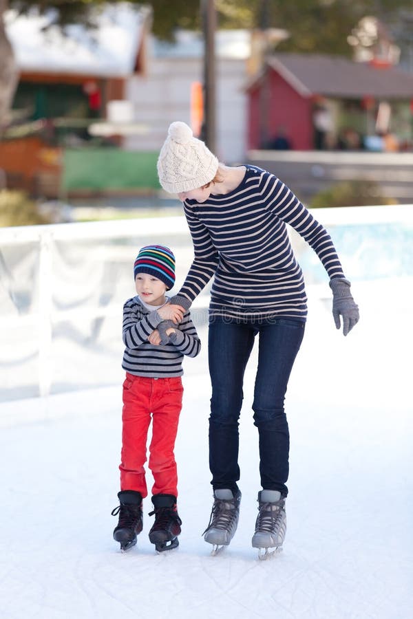 Family ice skating stock image. Image of happiness, rink - 35110067