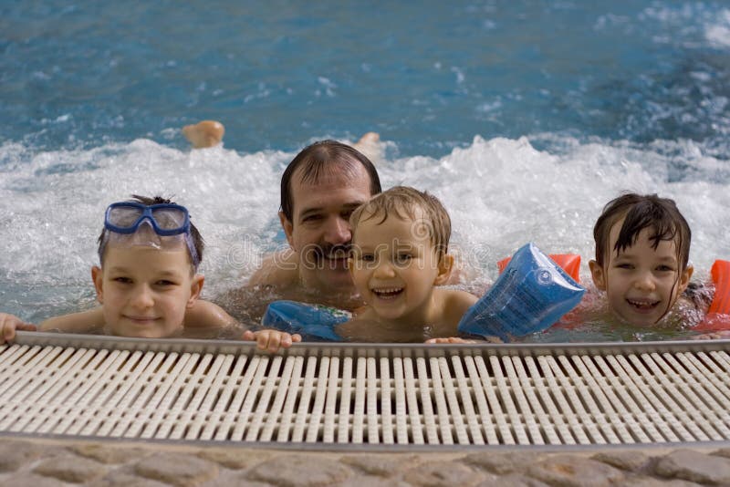 Family in jacuzzi stock image. Image of father, happy, kids - 638523