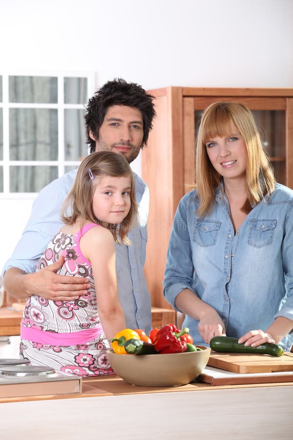 Family in kitchen stock image. Image of affectionate - 27579517