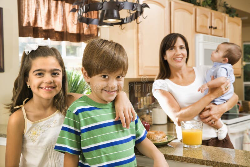 Family in kitchen. stock image. Image of lifestyle, horizontal - 4246231