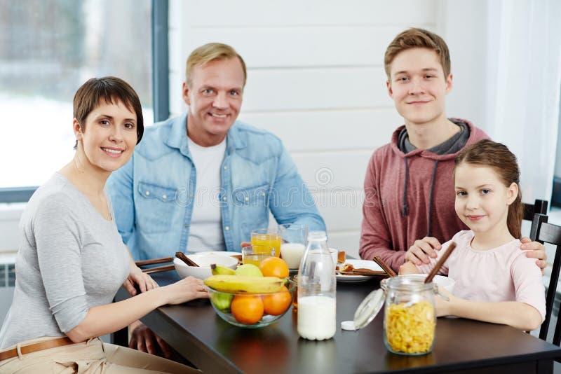 Family in the kitchen stock image. Image of slowfood - 86660991