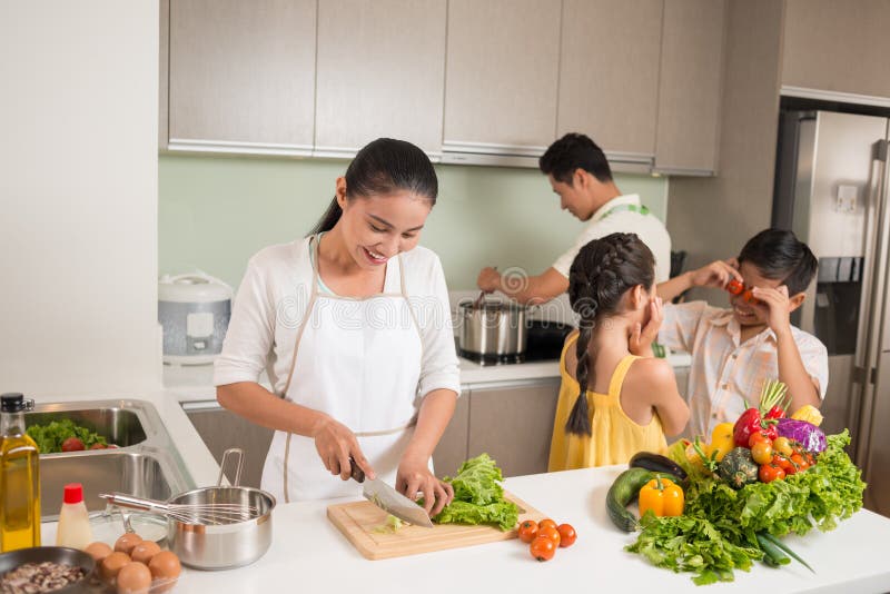 Family in the kitchen stock photo. Image of home, laugh - 43961730
