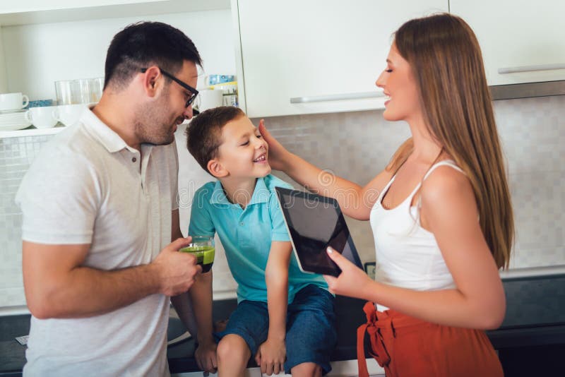 Family in the Kitchen Using Digital Tablet Stock Photo - Image of fresh ...