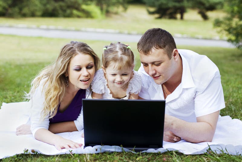 Family on Computer stock photo. Image of caucasian, mother - 1023654