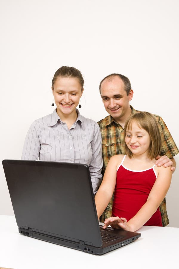 Family Using Laptop stock image. Image of leisure, mobility - 1924151