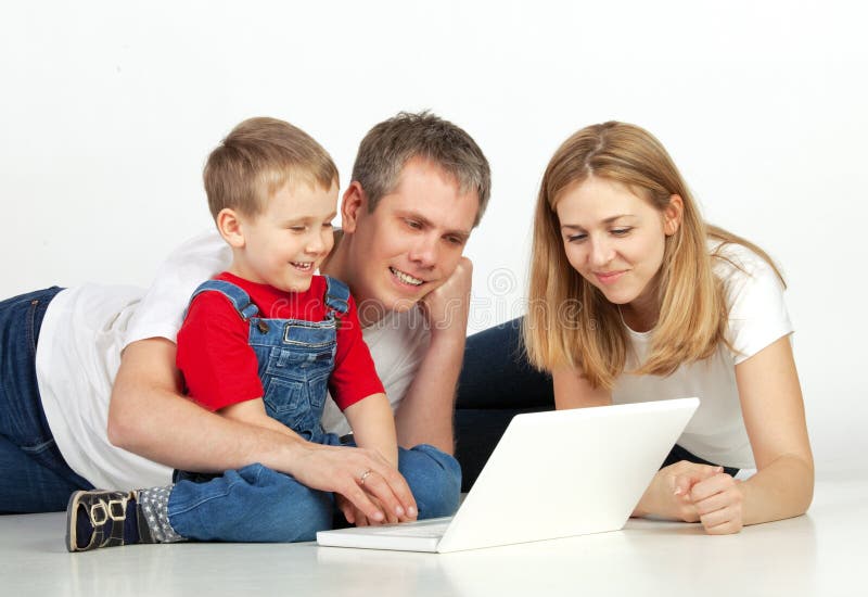 Family with laptop stock image. Image of family, couple - 14460799