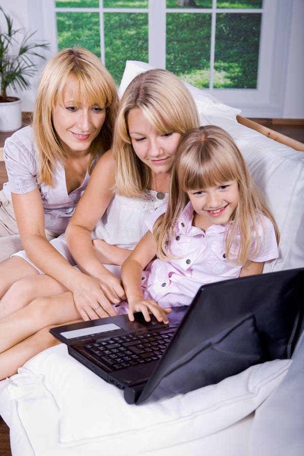 Family with laptop stock image. Image of woman, people - 16849523