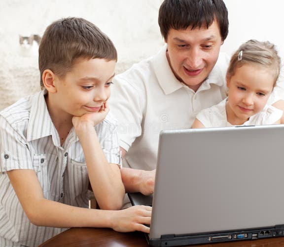 Family with laptop stock photo. Image of homework, children - 22806442