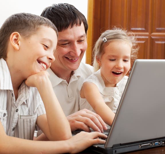 Family with laptop stock image. Image of adults, daughter - 22806447
