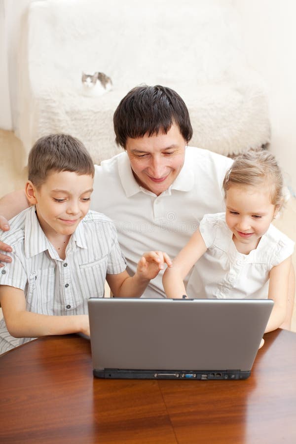 Family with laptop stock photo. Image of kids, working - 22806452