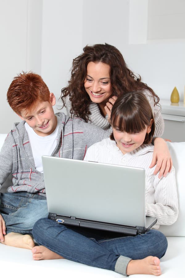 Family with Laptop Computer Stock Photo - Image of family, teaching ...