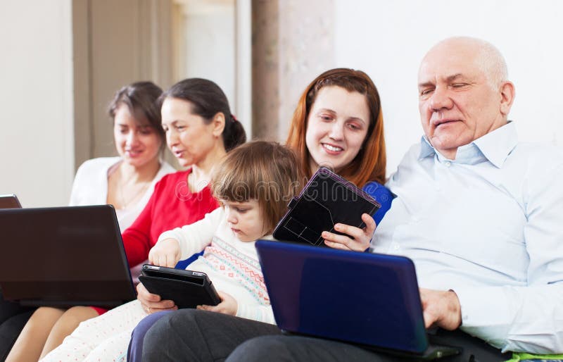 Family with Laptops at Home Stock Image - Image of male, female: 29731537