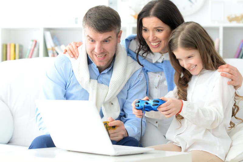 Family with computer stock image. Image of attractive - 20610187