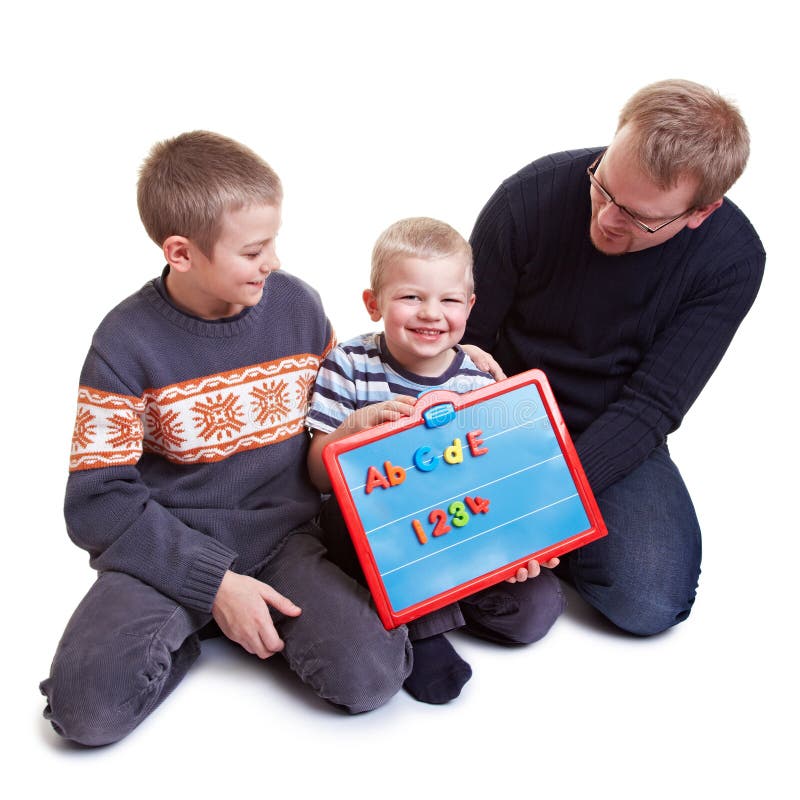 Family learning together stock photo. Image of magnets - 18943716