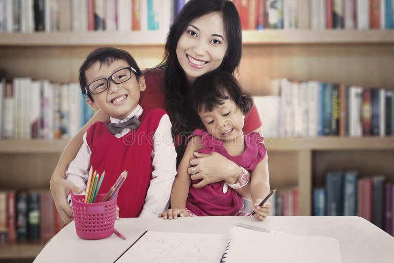 Family in library stock image. Image of color, book, kindergarten ...