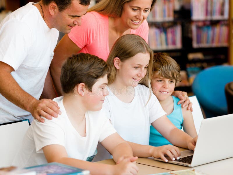 Family in library stock image. Image of kids, education - 53100883